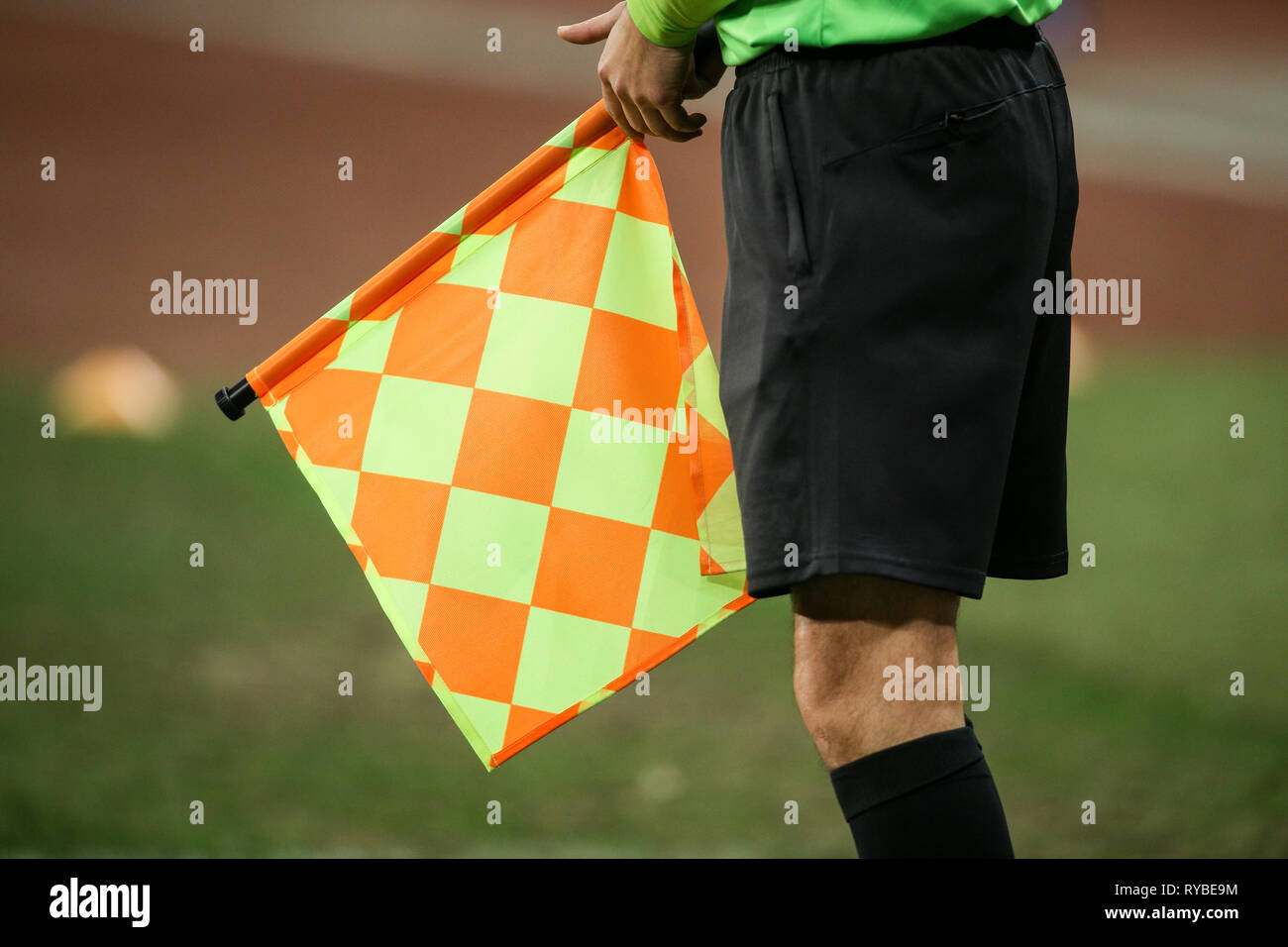 Details of a linesman referee during a soccer game Stock Photo - Alamy