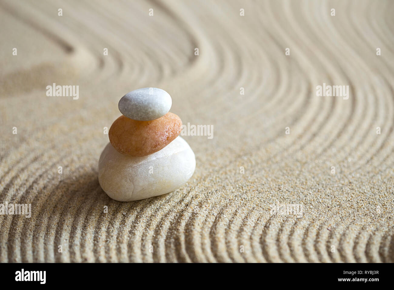 Zen garden with the stack of rocks Stock Photo - Alamy
