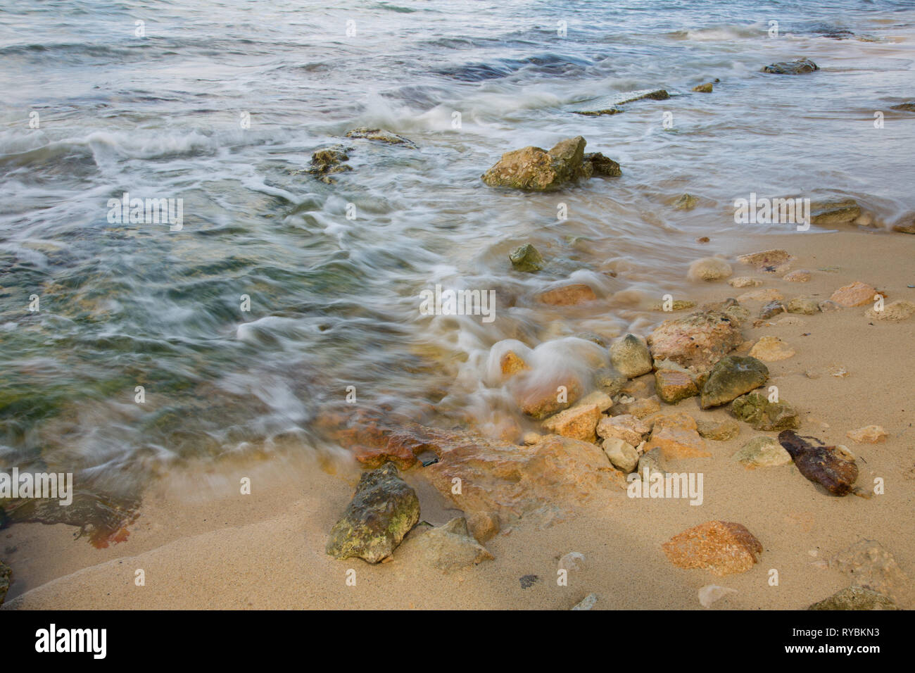Water in slow motion at beach Stock Photo - Alamy