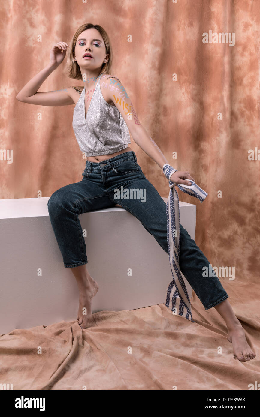 Nice young woman setting her hand free Stock Photo - Alamy