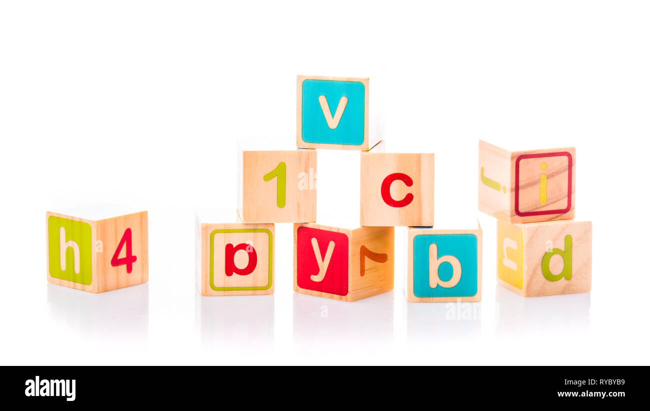 Toy cubes. Baby collection. ABC letters made from baby toys Stock Photo ...