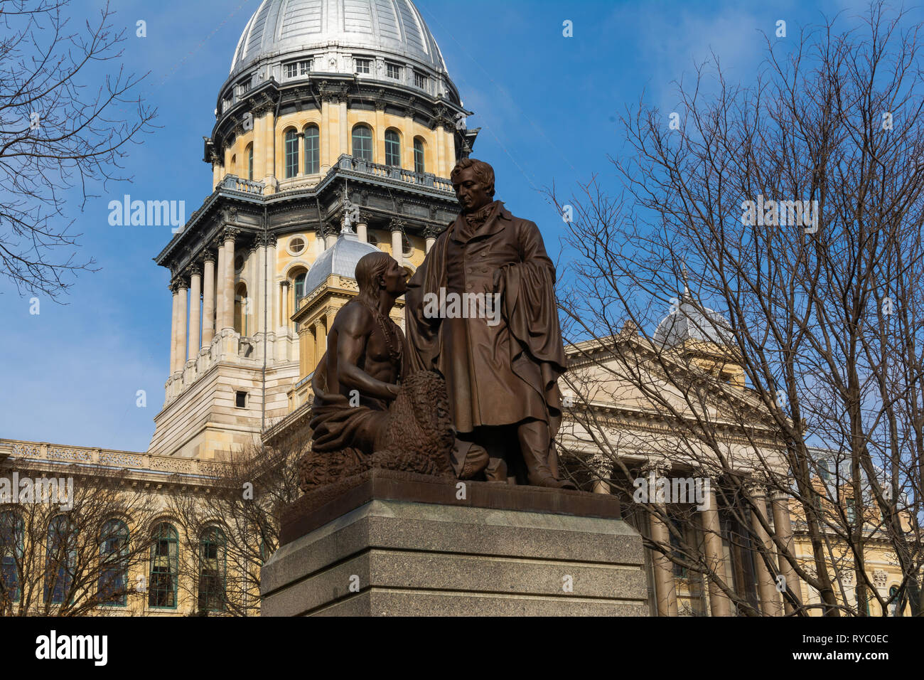 Statue with State Capitol Building in the background. Springfield ...