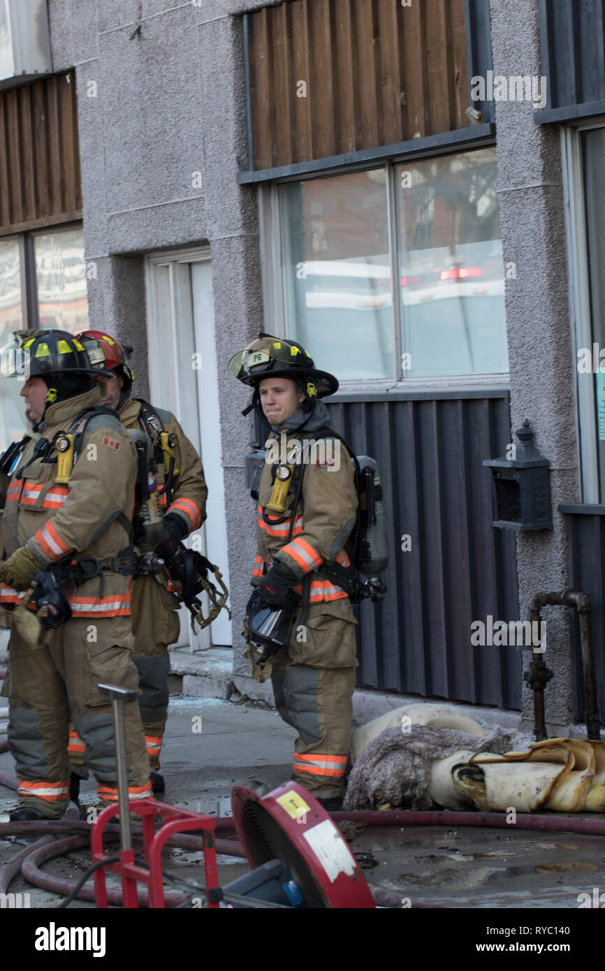 Hamilton, Canada 2019: Portrait of Firefighters wearing respirators and ...
