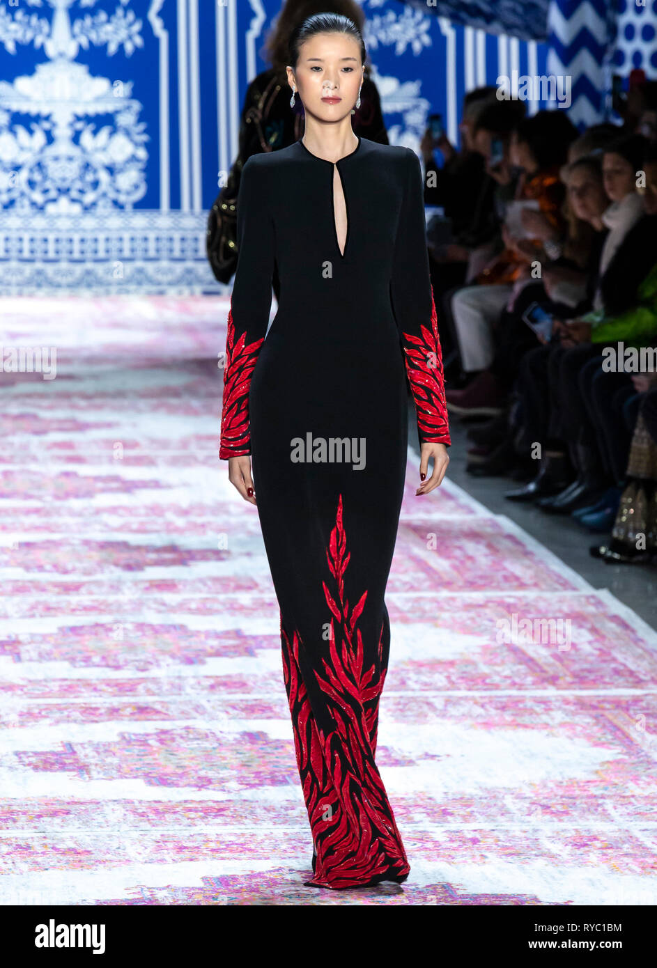New York, New York - February 12 2019: Hui Hui Ma walks the runway at ...