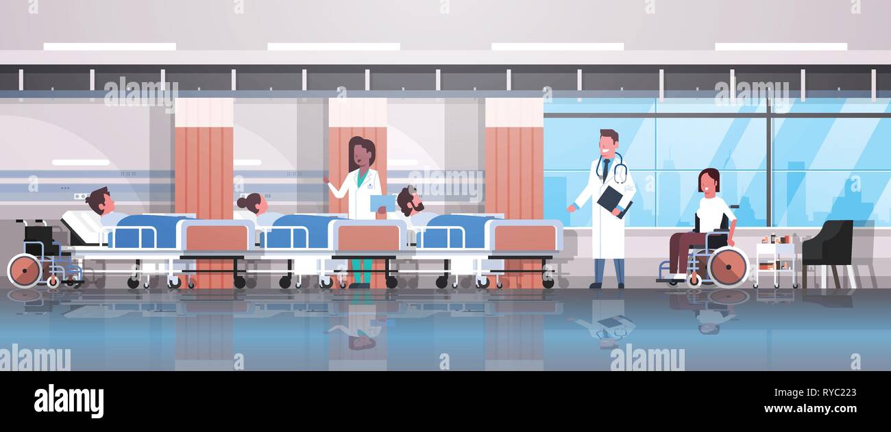 doctors team visiting disabled mix race patients sitting wheelchair ...