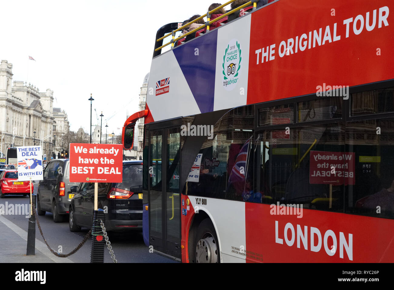 London tour bus passing the Brexit protest outside Parliament in London ...