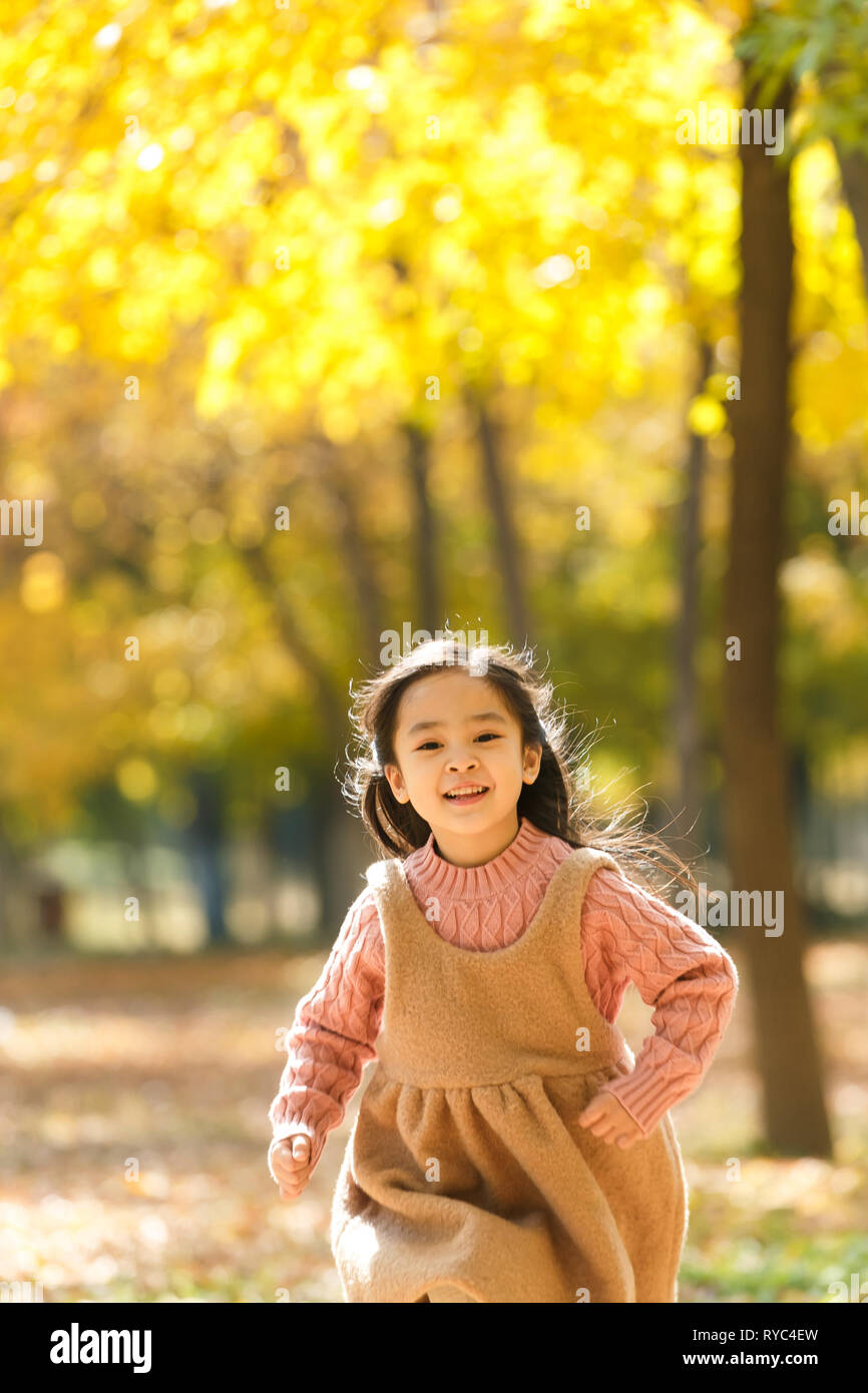 Smiling chinese girl running hi-res stock photography and images - Alamy