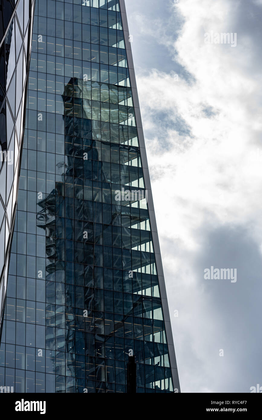 The "Cheesegrater" reflected in the "Scalpel" with 30 St Mary Axe ...