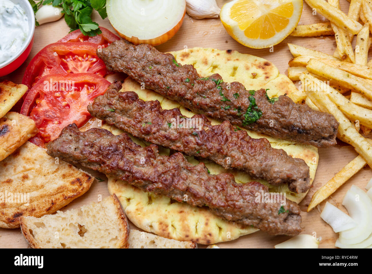 Kebab, traditional turkish, greek meat food on pita bread, tzatziki ...