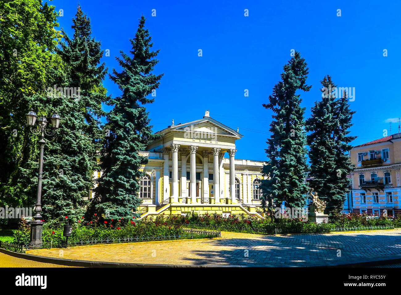 Odessa Archaeological Museum Side View between Trees with Clear Blue ...
