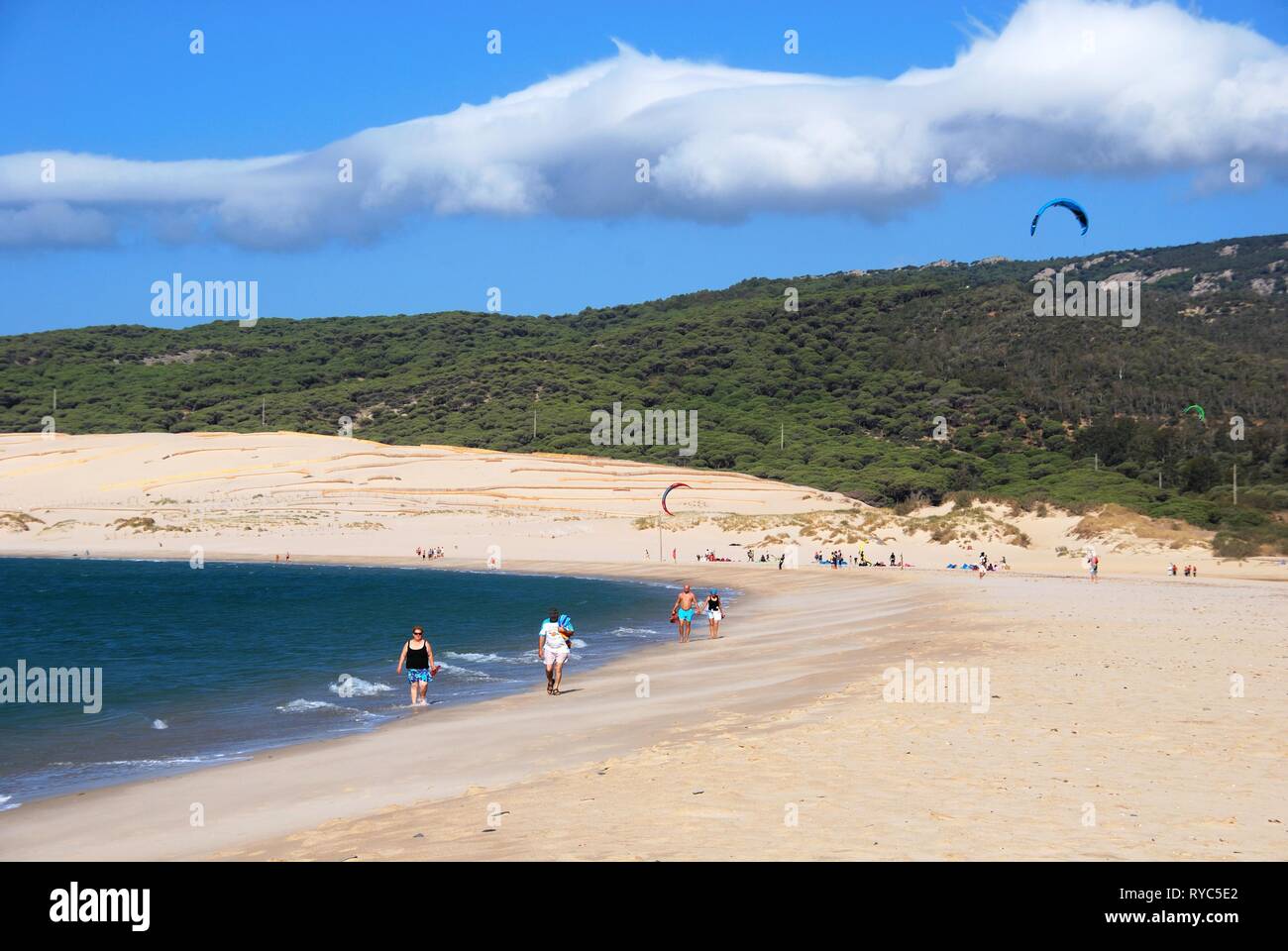 TARIFA, SPAIN - SEPTEMBER 14, 2008 - Tourists relaxing on Valdevaqueros ...