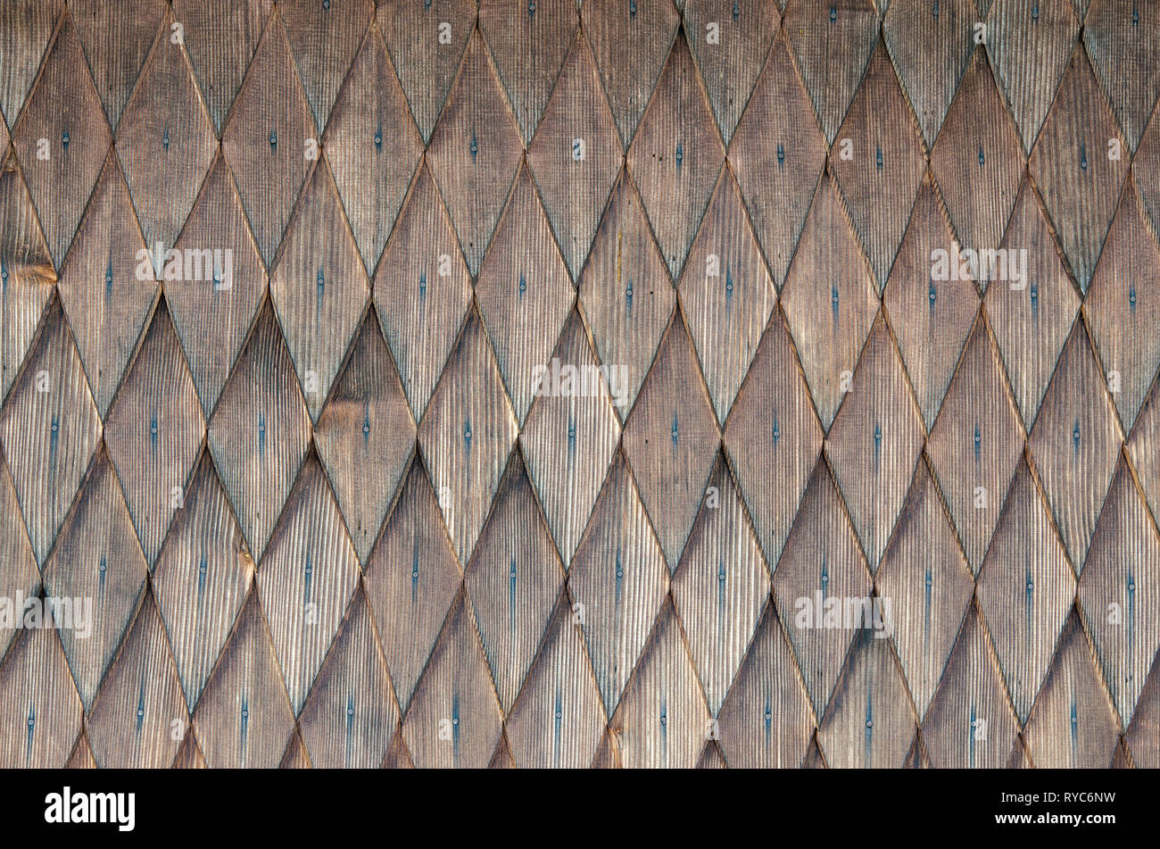 Background of successive rows of wooden rhombuses. Pattern of geometric ...