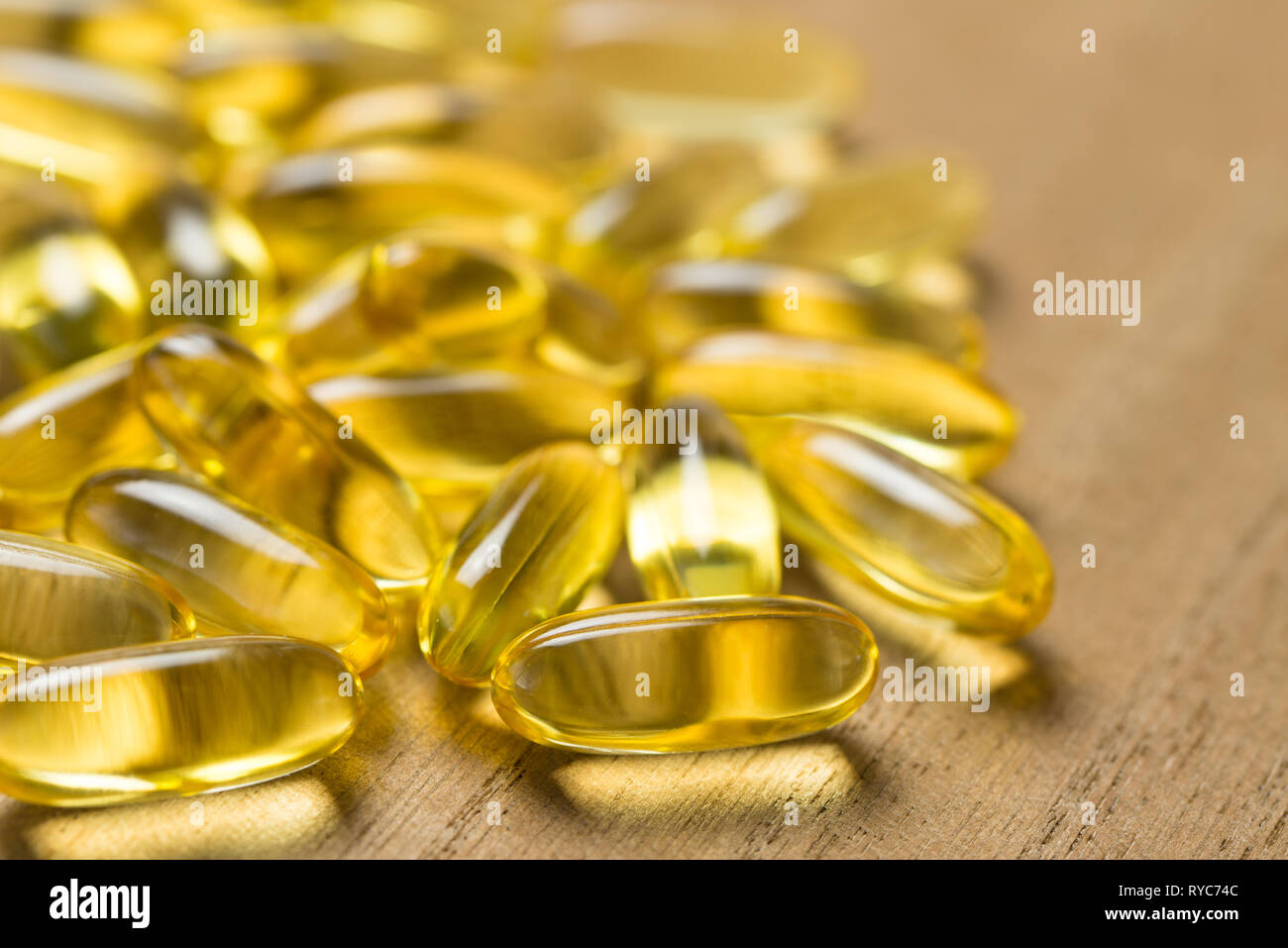 Pile of Omega 3 fish oil capsules Stock Photo - Alamy