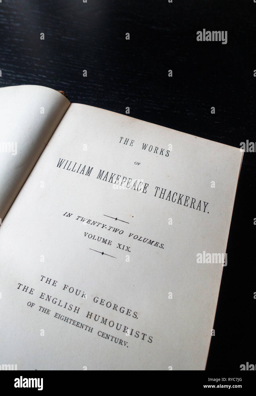 Close up of a book called Thackeray’s Works by William Makepeace ...