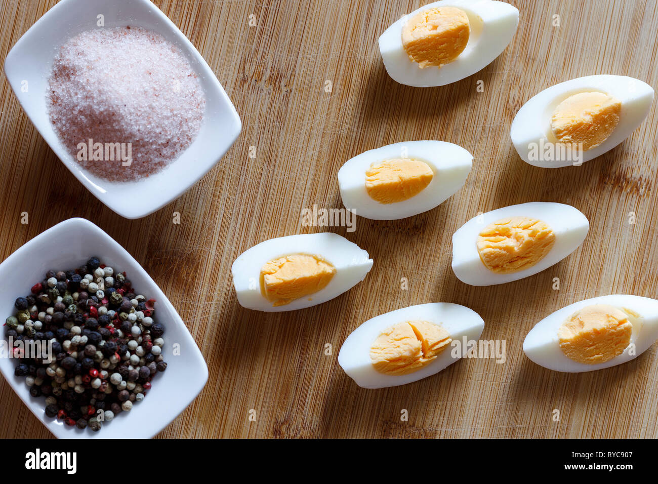 Hard boiled egg on wooden background Stock Photo - Alamy
