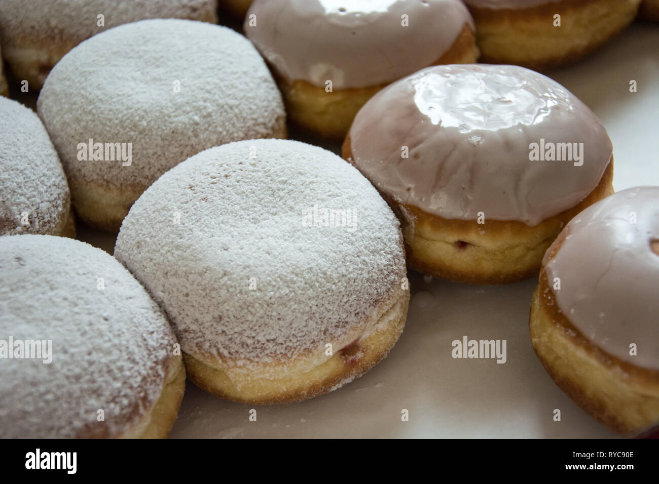 Donuts with icing hi-res stock photography and images - Alamy