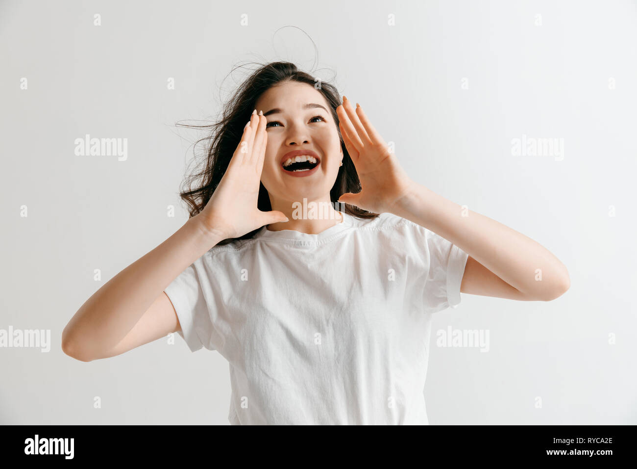 Do not miss. Young casual woman shouting. Shout. Crying emotional woman ...