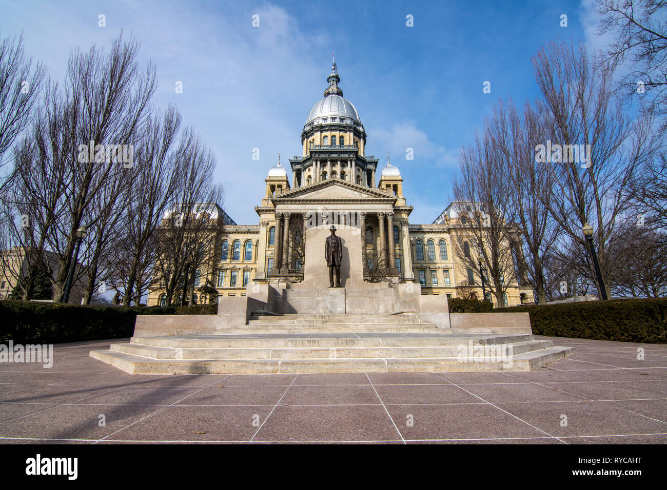 Abraham Lincoln statue standing proud in front of the state capitol ...