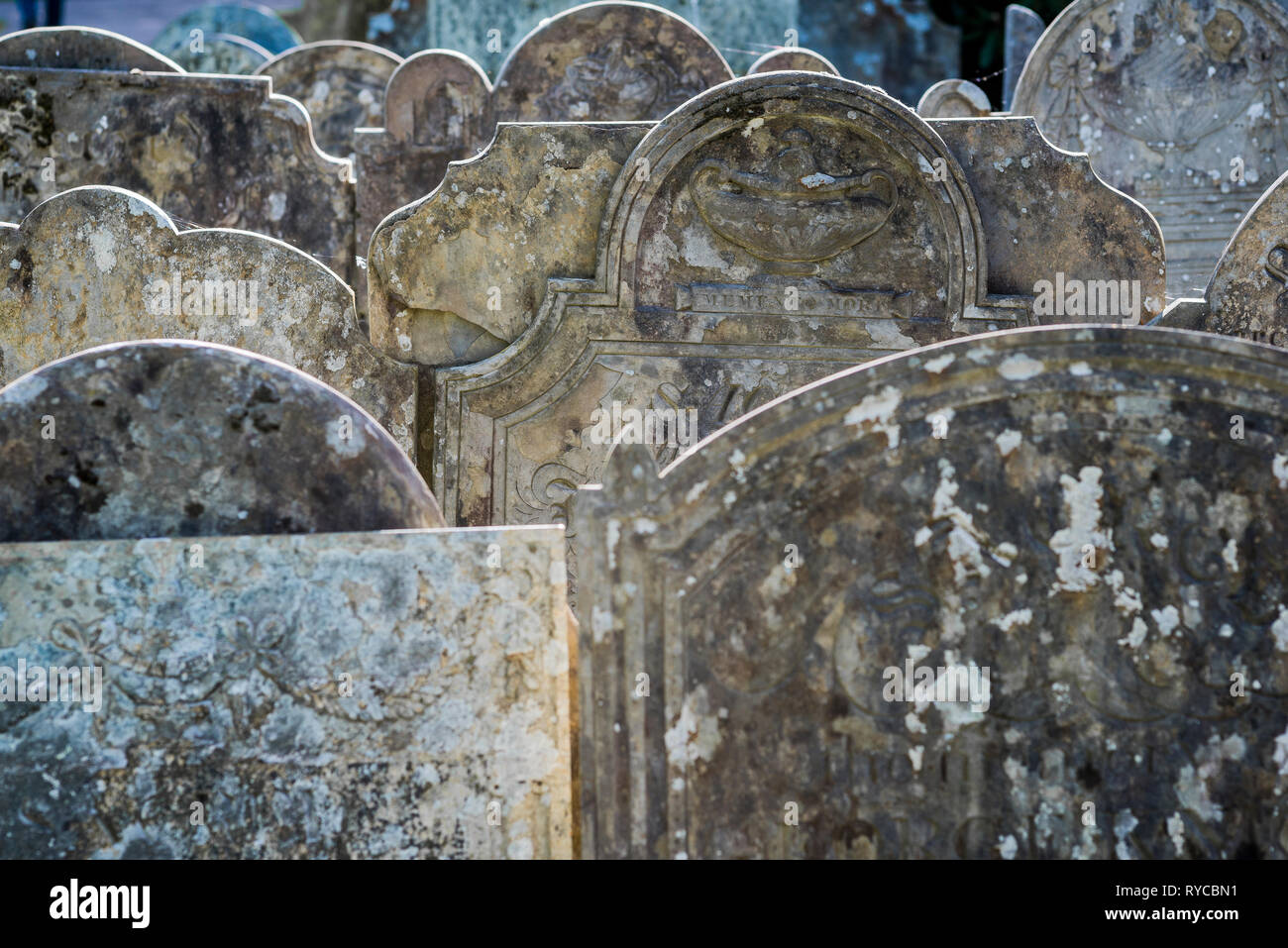 Old grave stones, one with the Latin inscription 'Memento mori ...