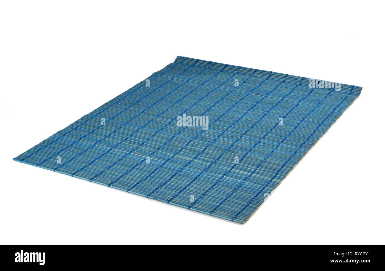 Blue bamboo sushi mat isolated on white background. Traditional ...