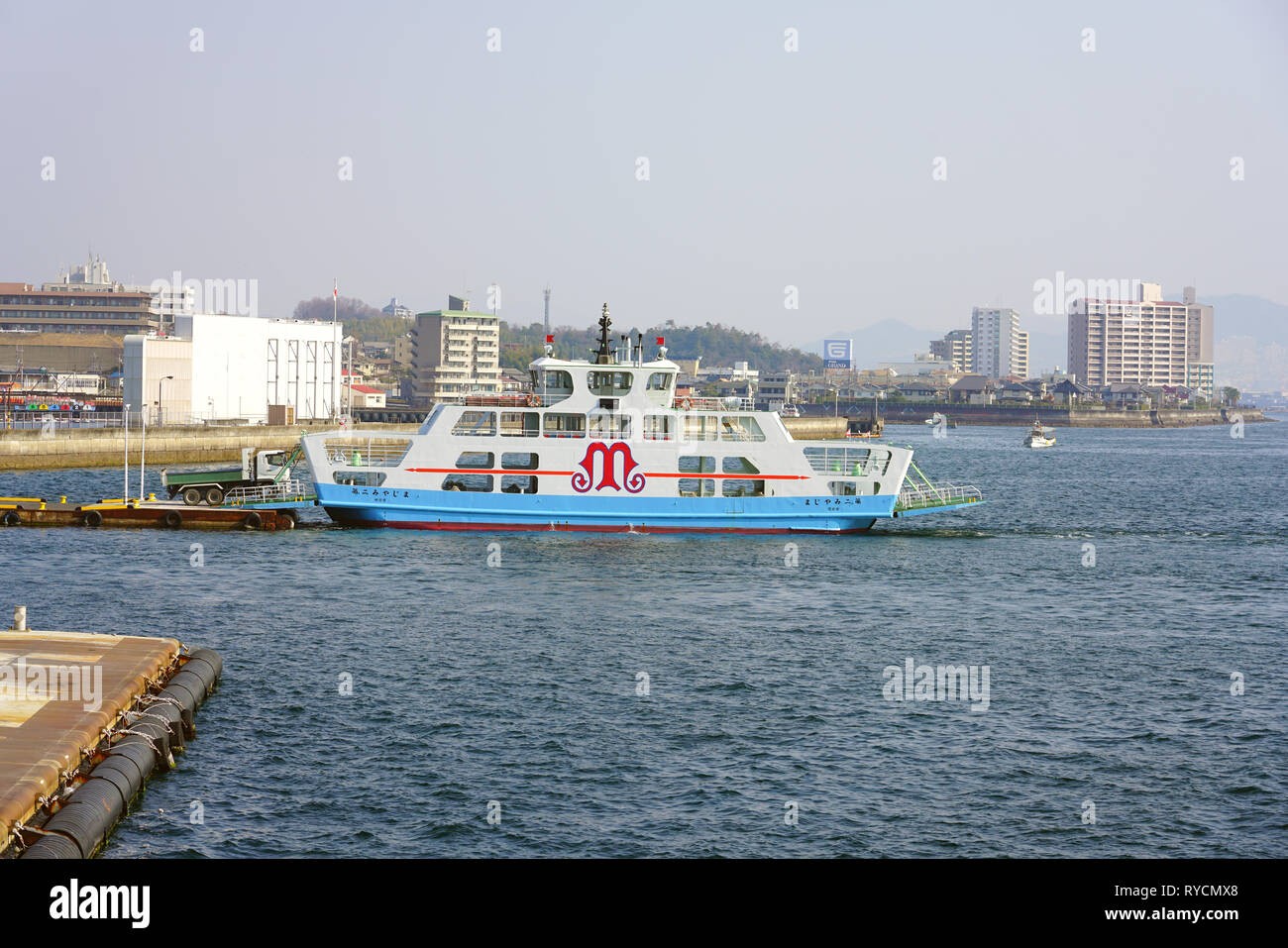 MIYAJIMA, JAPAN -26 FEB 2019- View of a ferry transporting visitors to ...