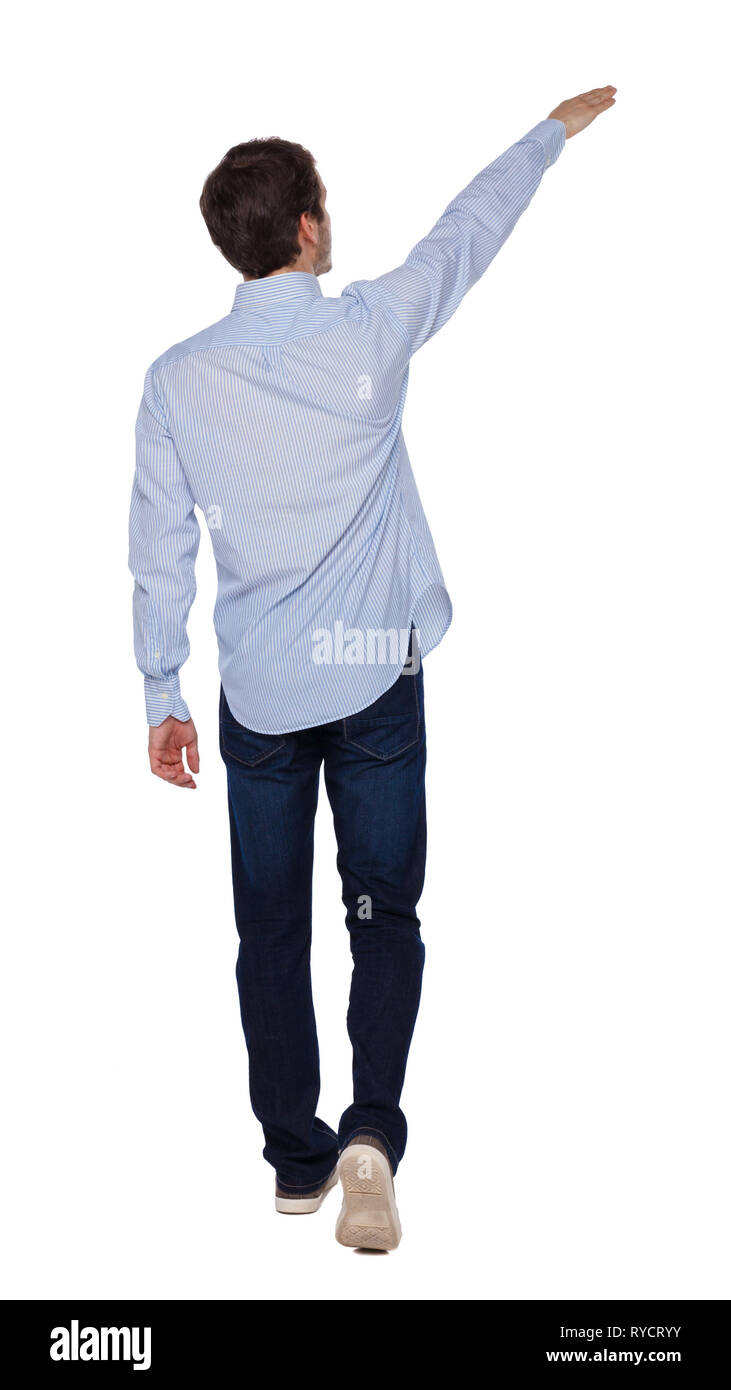 Back view of a man walking with a pointing hand. going guy showing ...