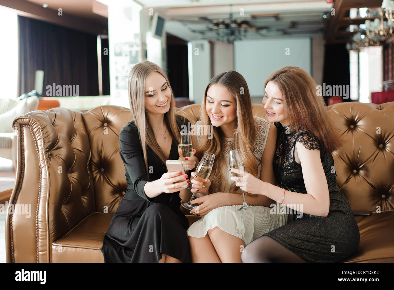Beautiful hot girls having party fun, drinking champagne Stock Photo ...