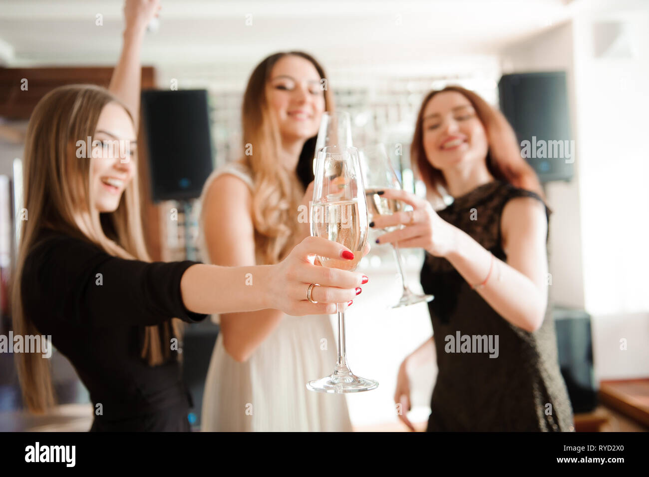 Group people with champagne dancing at the party Stock Photo - Alamy