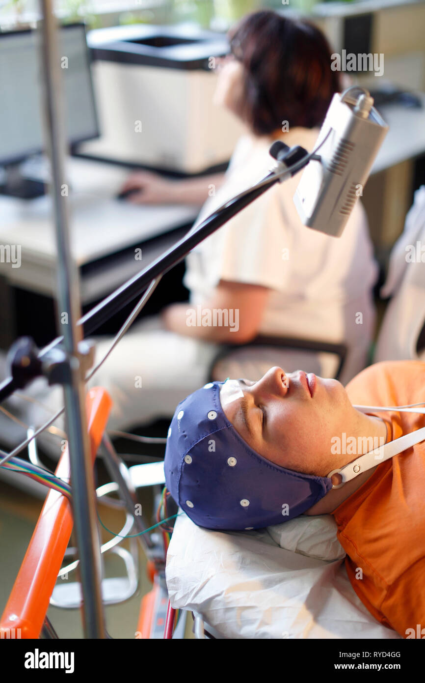 young man during electroencephalography examination Stock Photo - Alamy