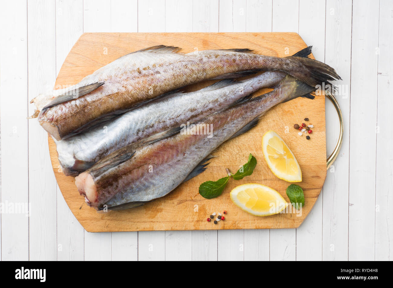 Raw pollock hake fish hi-res stock photography and images - Alamy