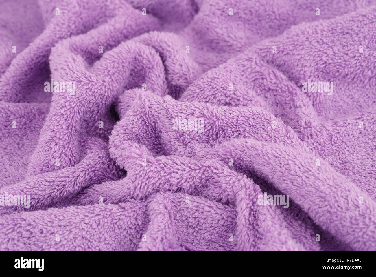 Violet towel texture as a background Stock Photo - Alamy