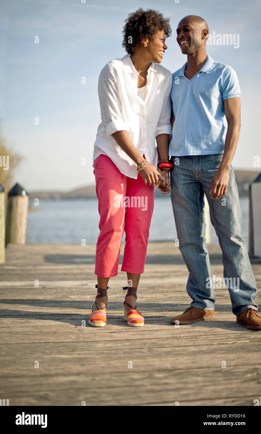Standing couple in denim hi-res stock photography and images - Alamy