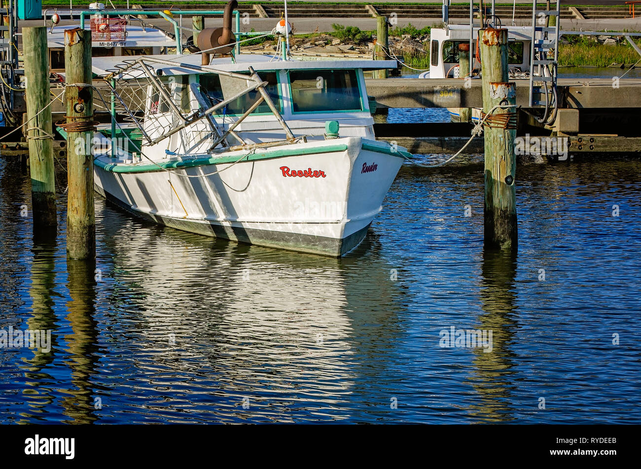 A small wooden fishing boat is docked in Pass Christian Harbor, Feb. 24 ...