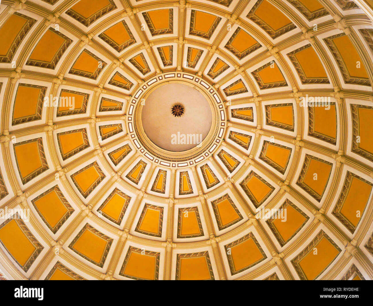 Concentric rings and yellow painted panels inside the dome of the ...