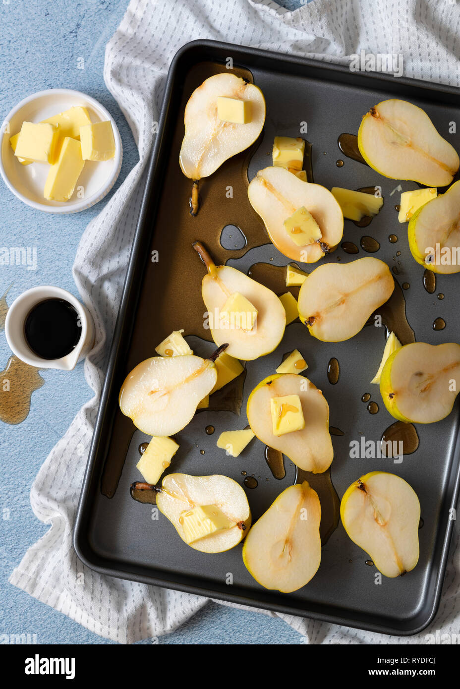 Preparation of pears roasted in maple syrup Stock Photo - Alamy
