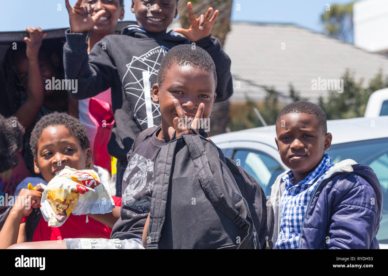 African children group, various ages, smiling and happy, making a peace ...