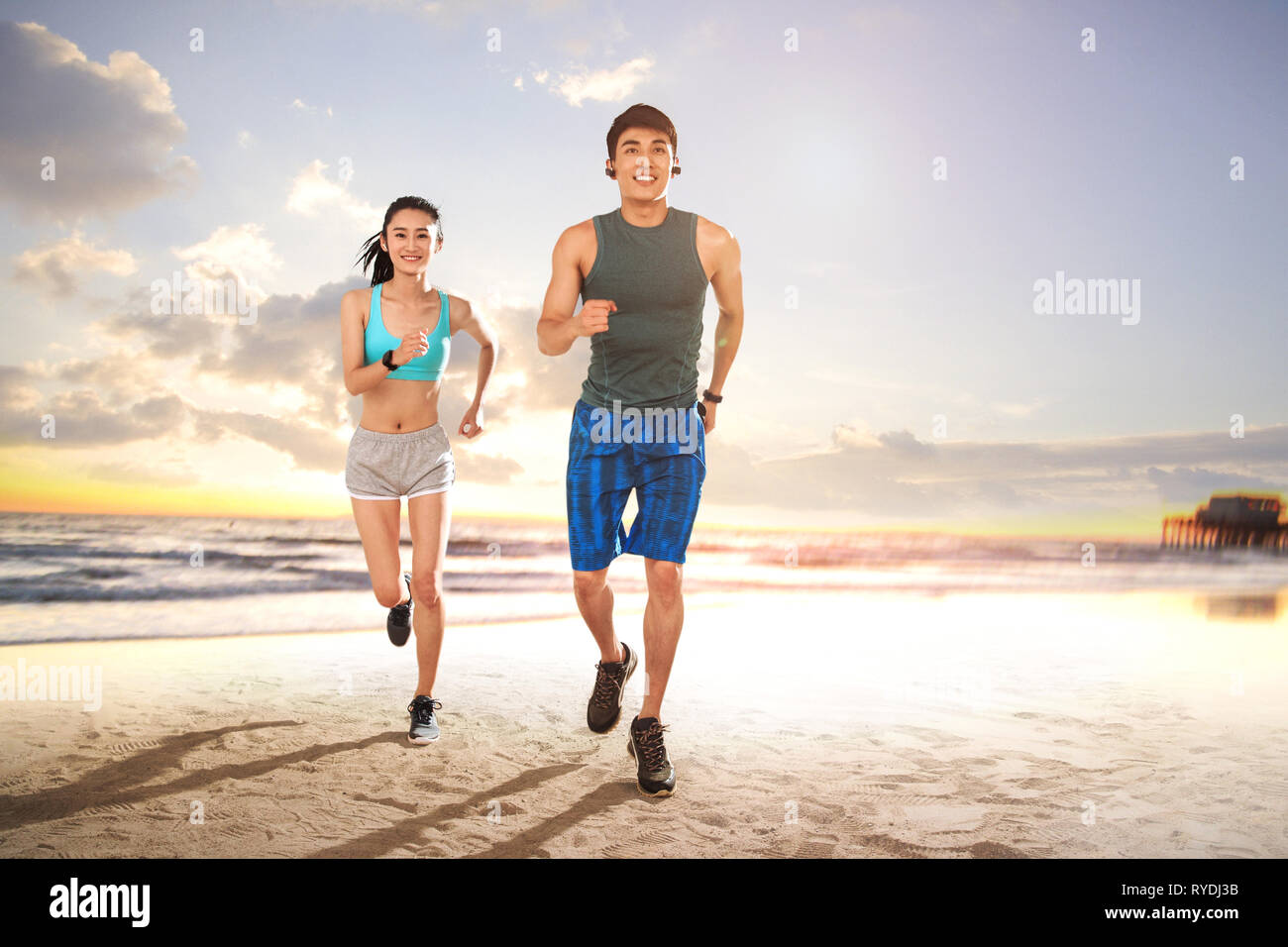 Indian couple beach running hi-res stock photography and images - Alamy