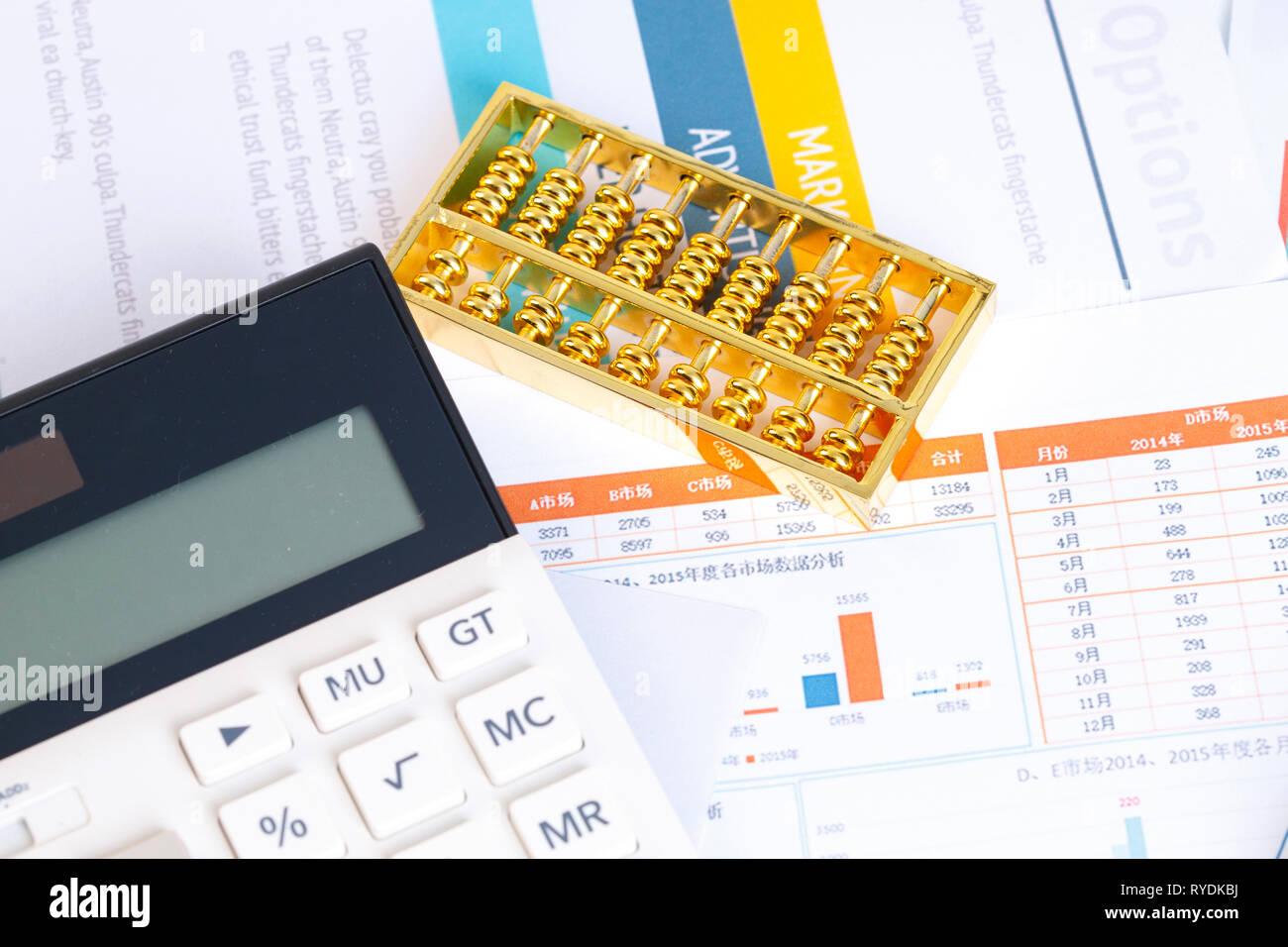Statements and calculator Stock Photo - Alamy