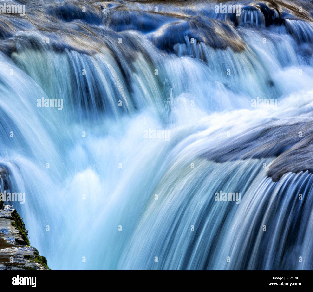 Water cascading over rocks in the Afon Pyrddin river, part of the ...