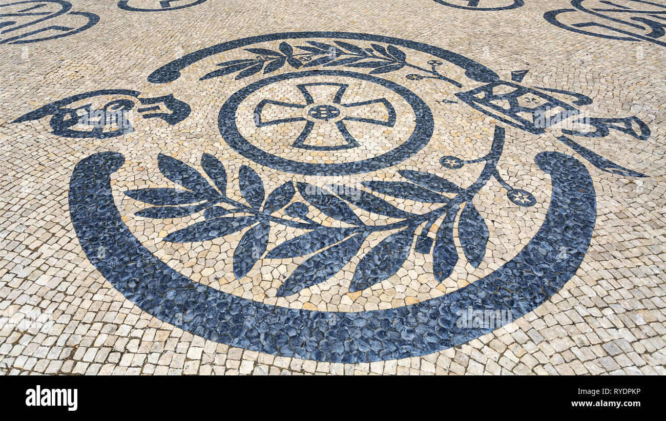Typical Portuguese cobblestone pavement creating balck and white ...