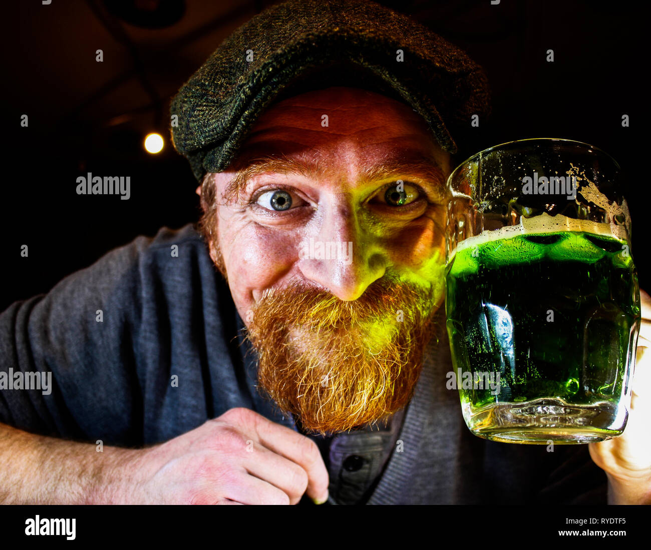 Crazy Irish guy drinks green beer during celebration of St Patrick's ...