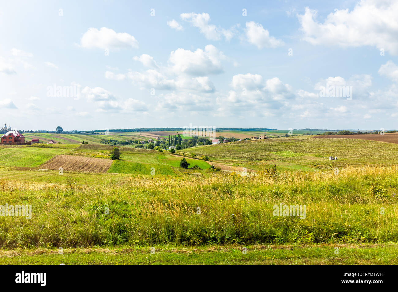 Open field with houses hi-res stock photography and images - Alamy
