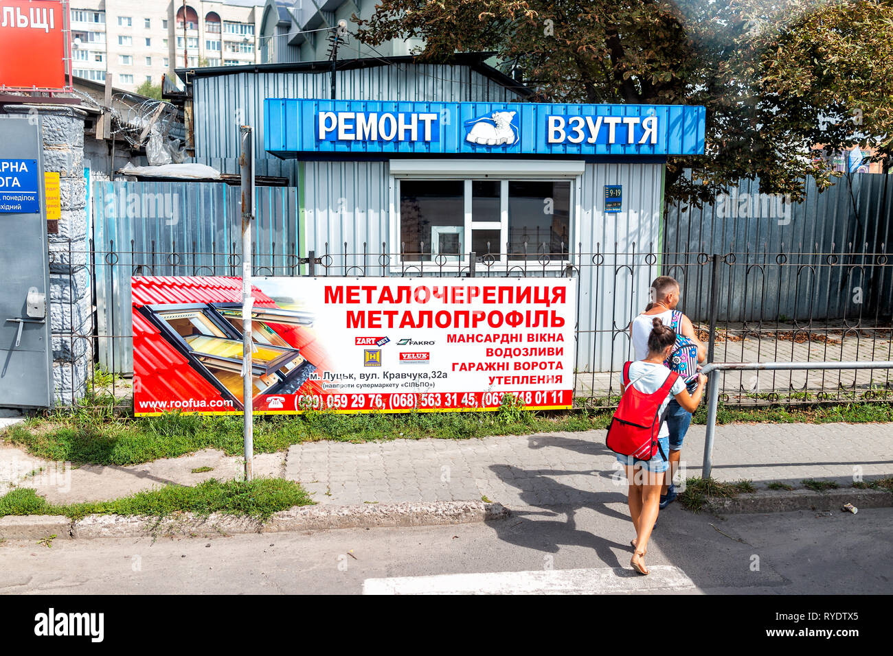Lutsk, Ukraine - August 21, 2018: Street with advertisement for shoe ...