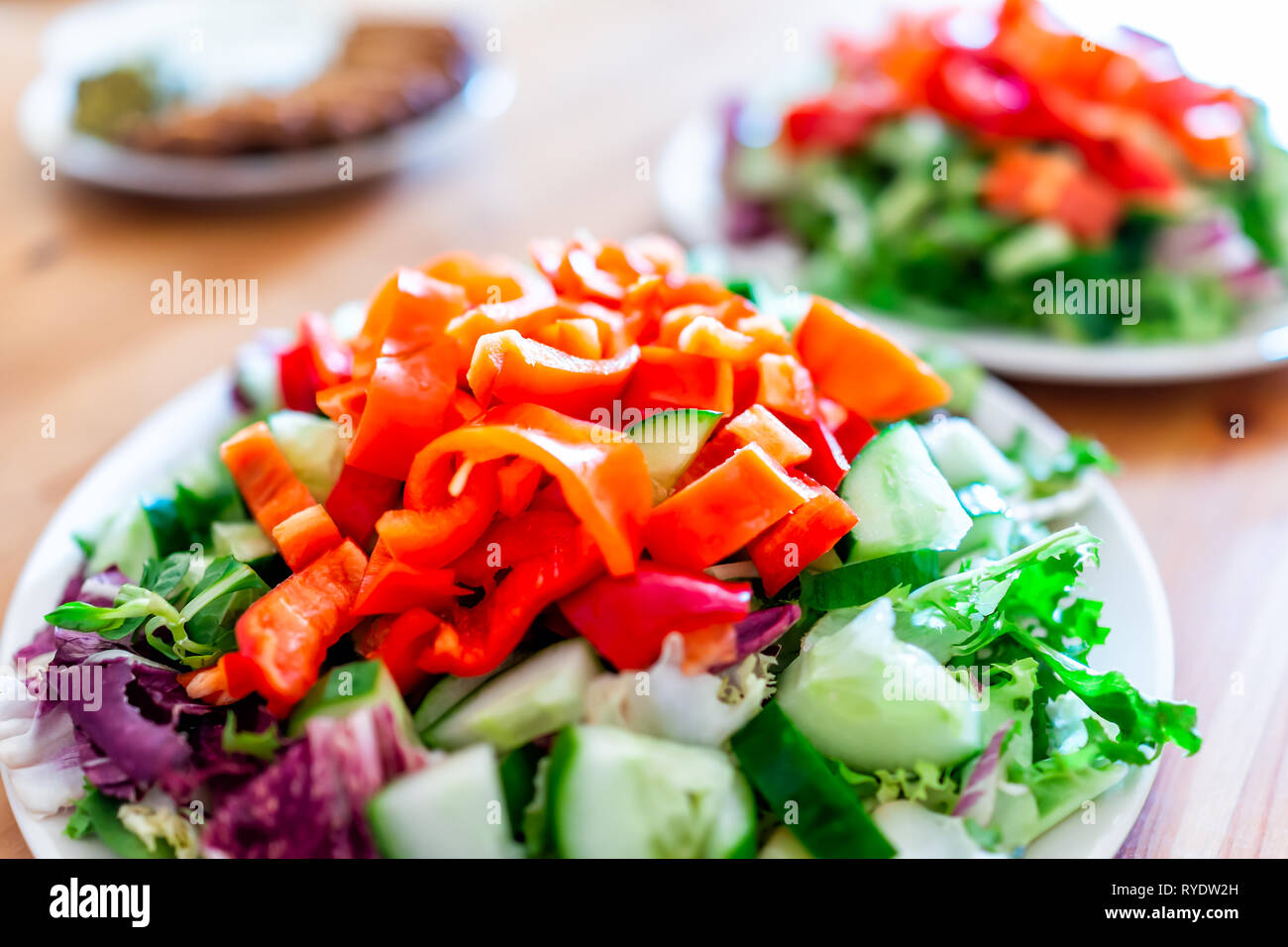 Wooden table with healthy vegan vegetarian lunch or dinner green ...