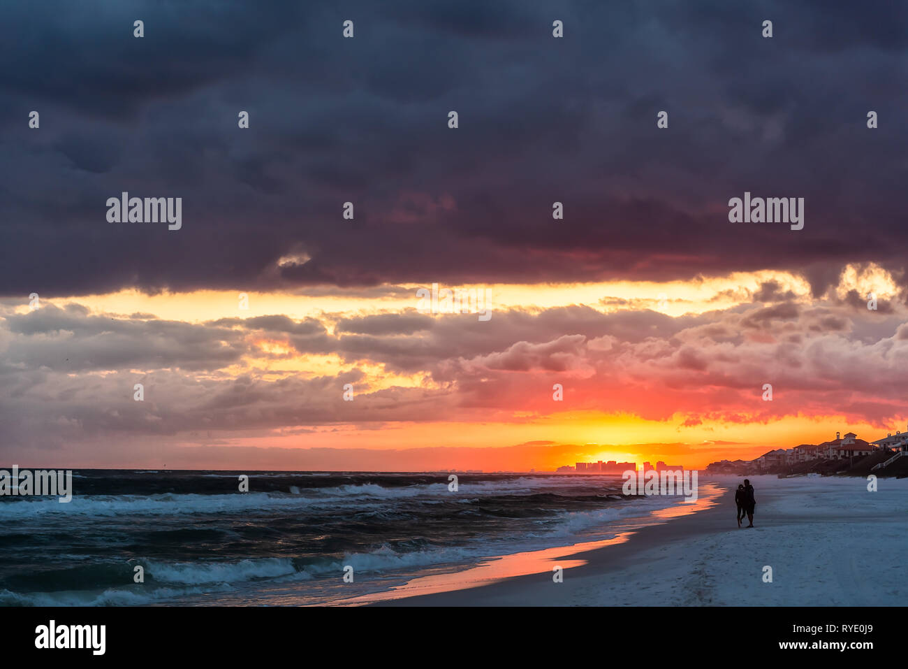 Red orange dramatic sunset and silhouette in Santa Rosa Beach, Florida ...