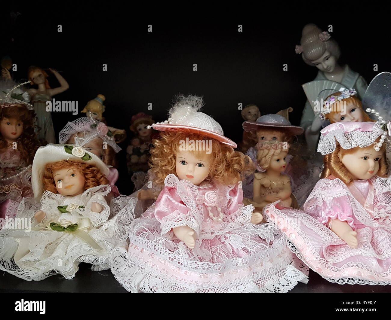 A collection of dolls and figurines Stock Photo - Alamy