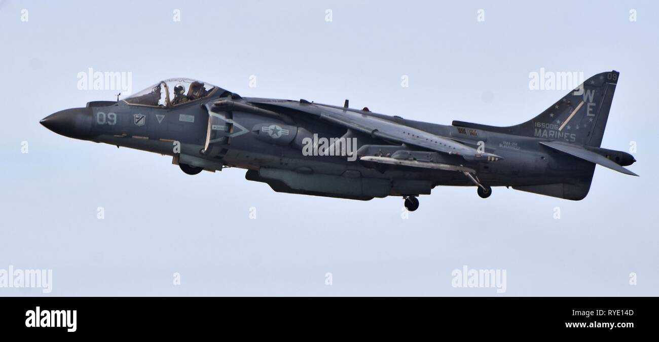 A Marine Corps Av 8b Harrier Jump Jet Belonging To Vma 214 Hovering At