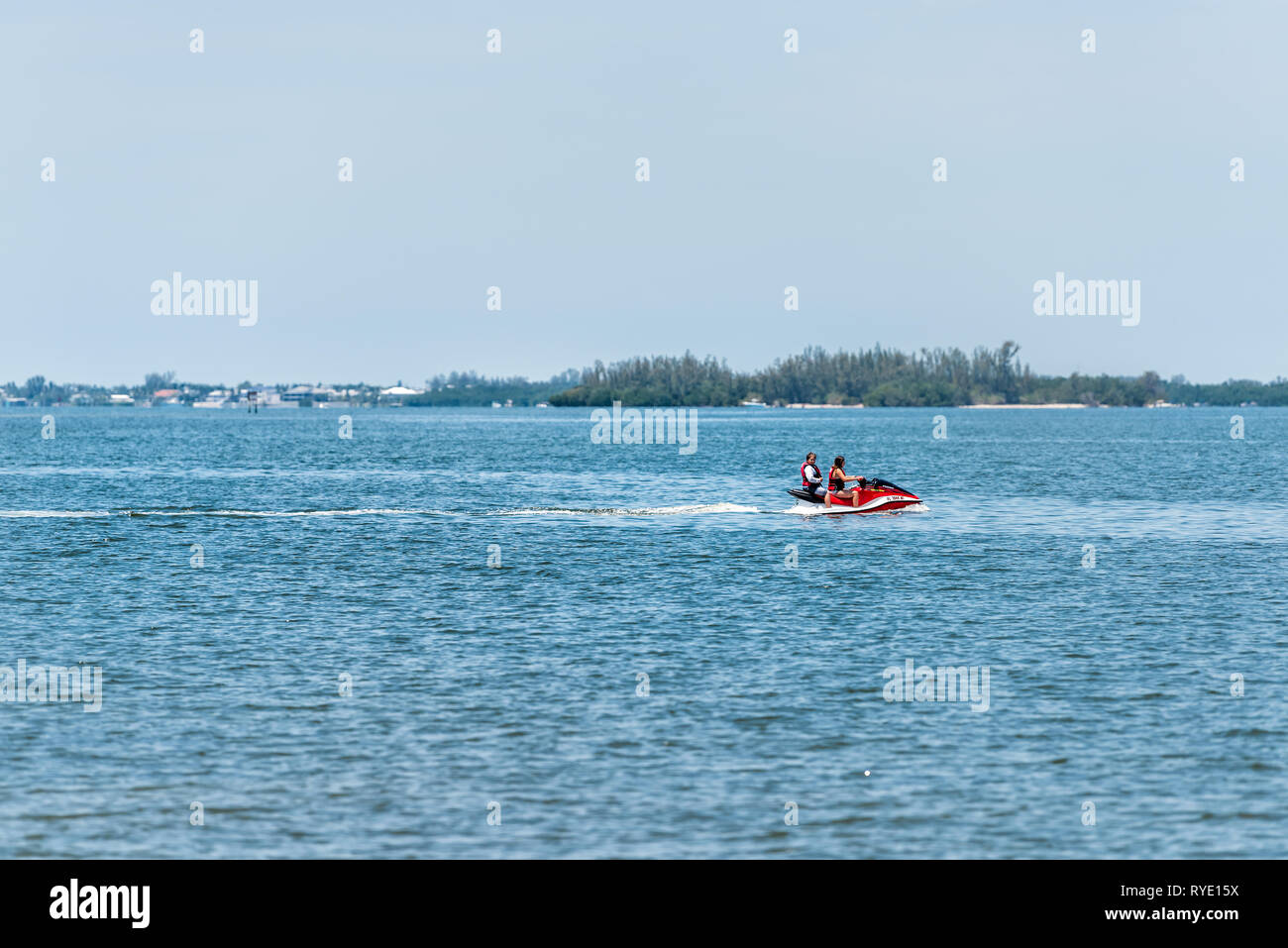 Sanibel Island, USA - April 29, 2018: Women riding motor boat in ...
