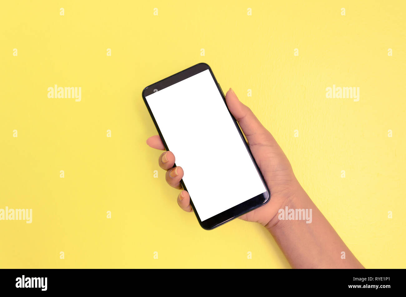 Human hand holding smartphone with white screen background, Mobile ...