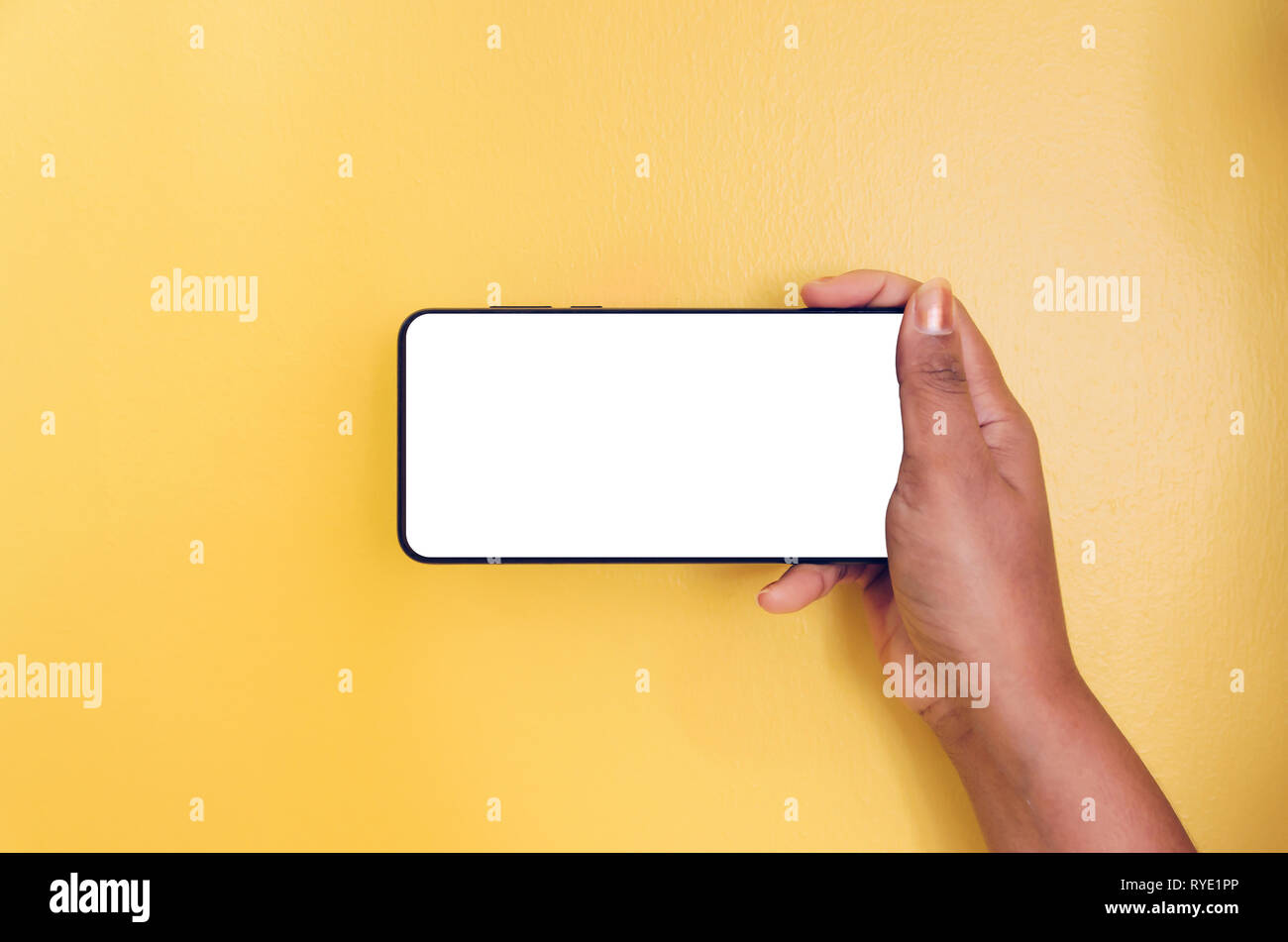 Human hand holding smartphone with white screen background, Mobile ...